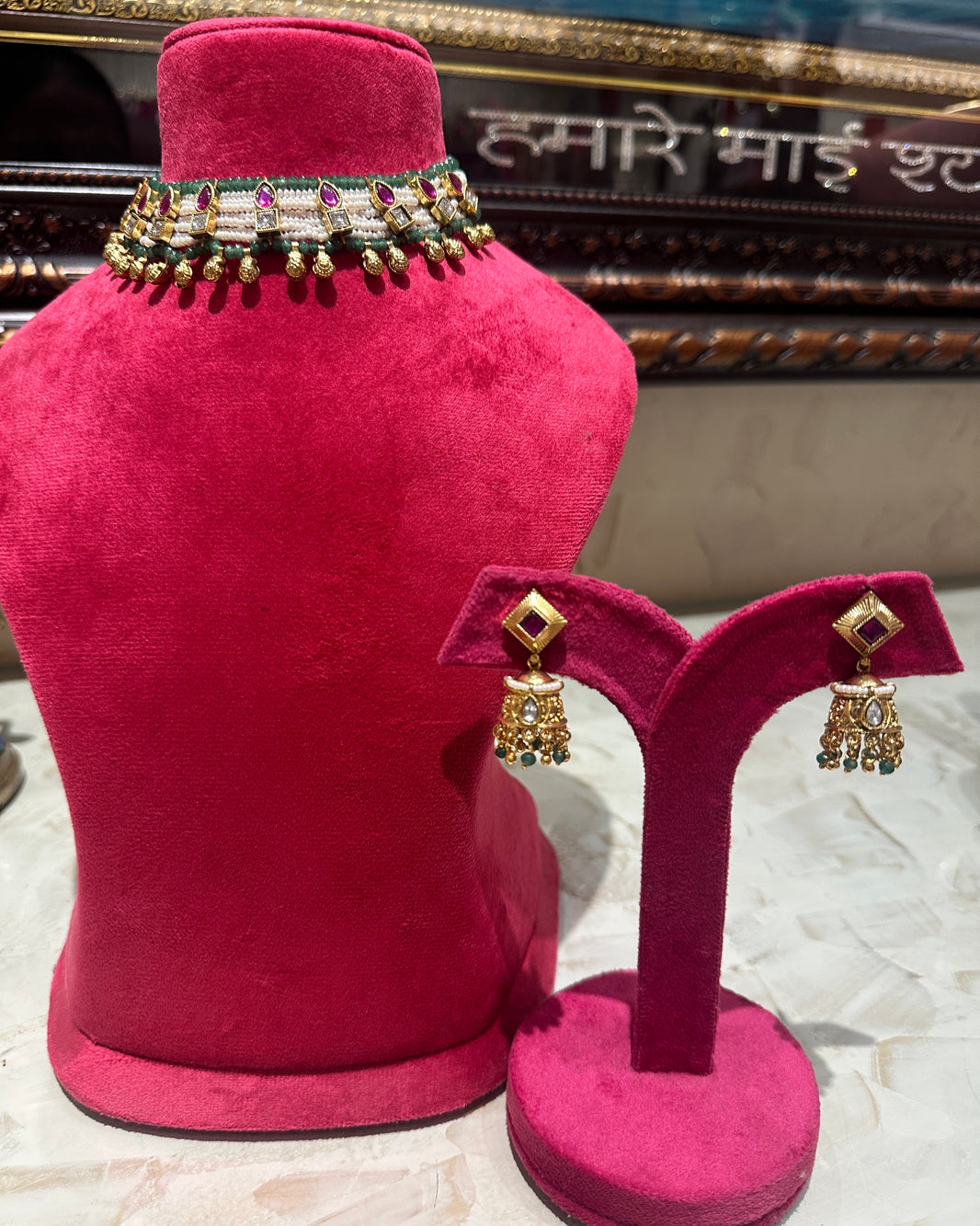 Stack of pearl jhumki choker set